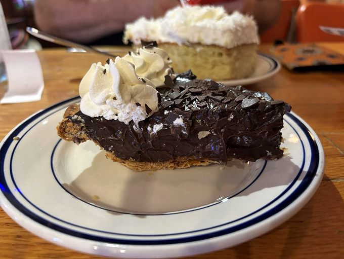 Chocolate cream pie with a swagger so confident it doesn't just sit on the plate&mdash;it poses, daring you not to photograph it first.