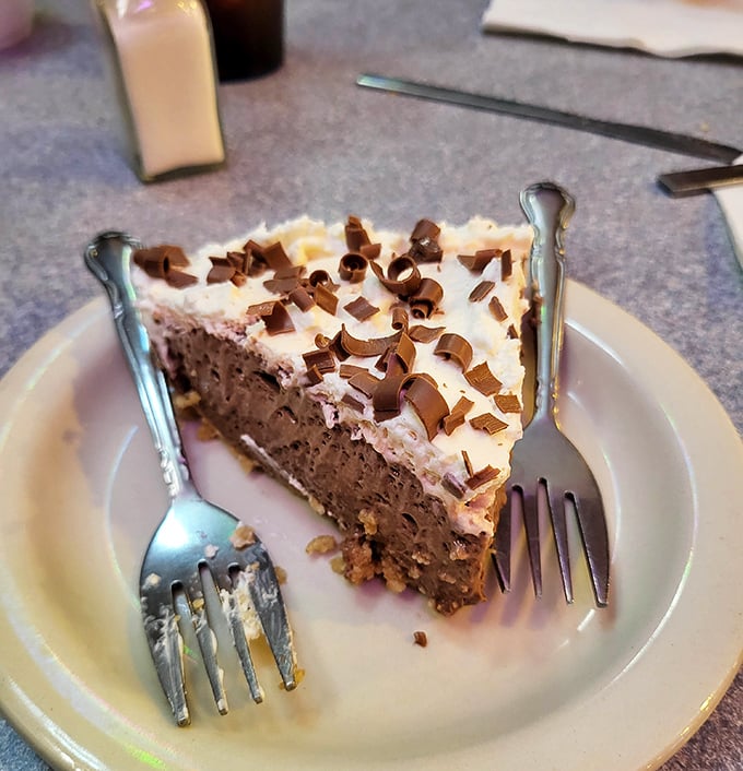 The chocolate cream pie at Sally's doesn't just end a meal—it creates a memory that will haunt your dessert dreams for weeks.