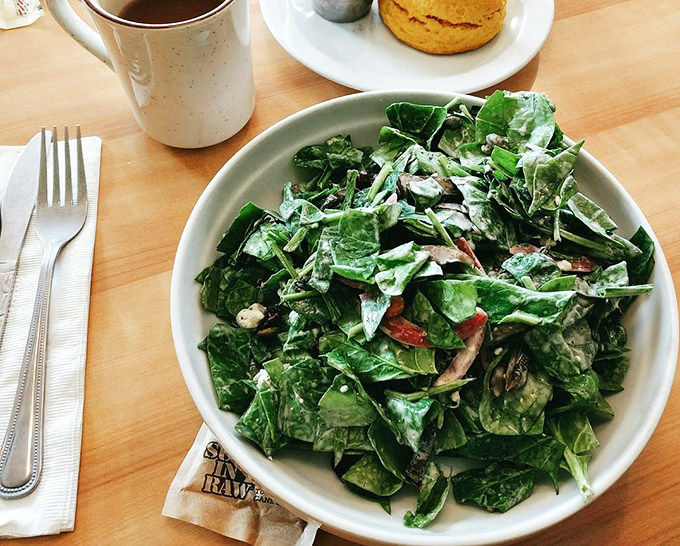 Even the salad looks like it's having more fun than most of us&mdash;fresh greens tossed with enough goodies to make you forget you ordered "healthy."