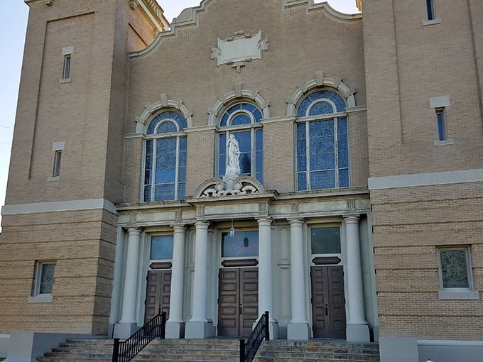 The Church of the Assumption rises majestically, proving that small towns can absolutely pull off impressive architectural statements.