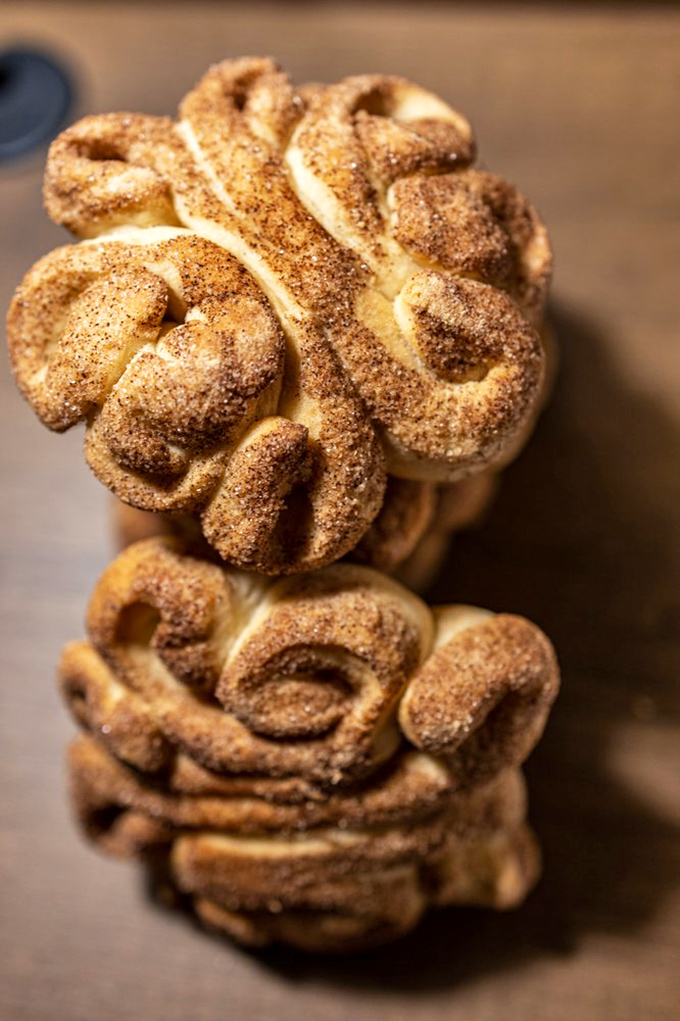 Pueblo cookies stacked like delicious architecture. The cinnamon-sugar coating isn't just a topping&mdash;it's the sparkle on an edible work of art.
