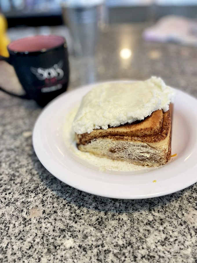 Cinnamon roll or work of art? This sweet masterpiece with cream cheese frosting is worth every calorie and then some.