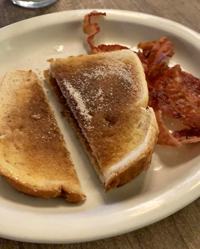 Cinnamon toast that would make your grandmother proud, paired with bacon that's achieved that mythical balance between crispy and chewy.