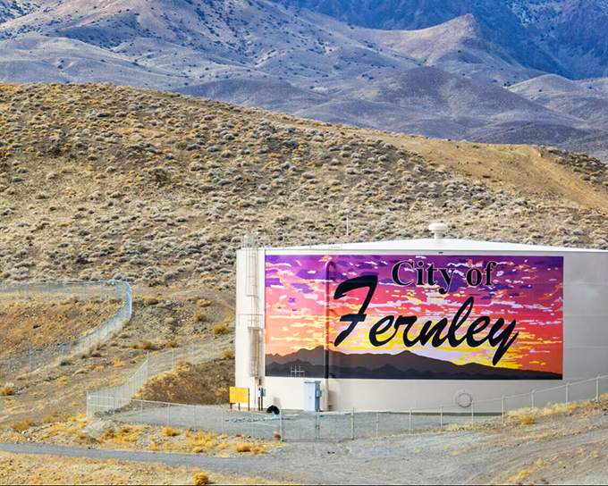 Sunset colors splash across Fernley's water tank. Even municipal infrastructure gets the beauty treatment in this photogenic desert town.