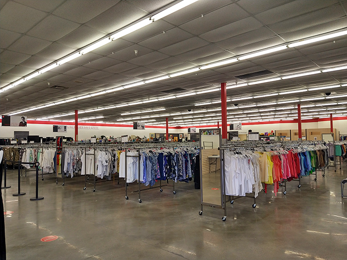 The clothing department stretches toward the horizon like a fabric sea, organized with a precision that would make Marie Kondo nod in approval.