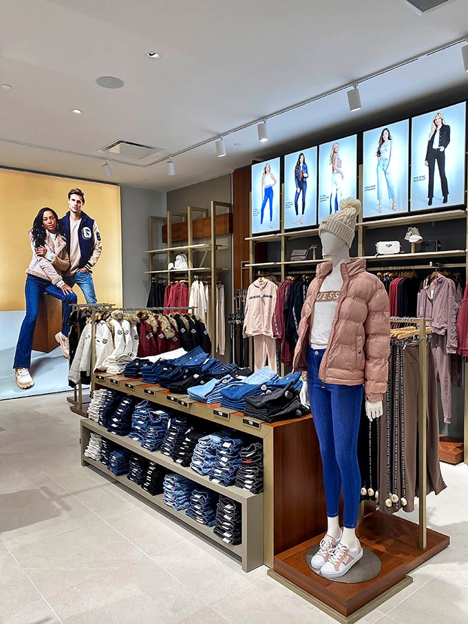 Mannequins modeling attainable fashion dreams. Those neatly folded stacks of denim promise organization that will never exist in your own closet.