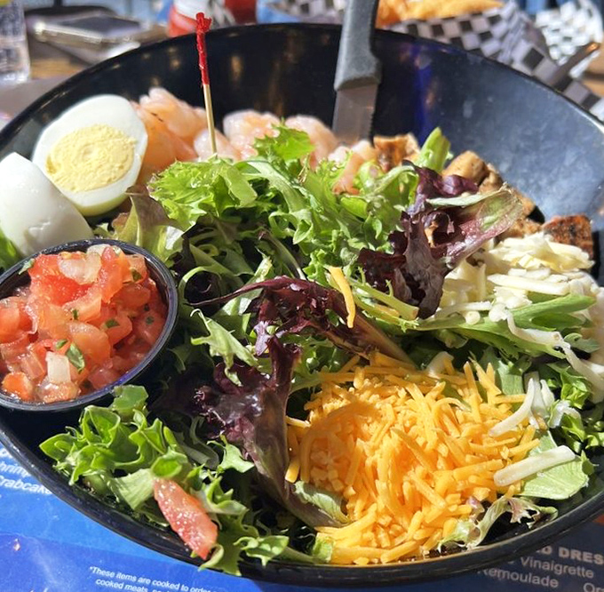 This isn't just a salad &ndash; it's a colorful coastal celebration where greens, cheese, and seafood come together for a refreshing party.