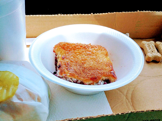 Homemade cobbler that would make your grandmother simultaneously proud and jealous. That golden crust is pure West Virginia magic.