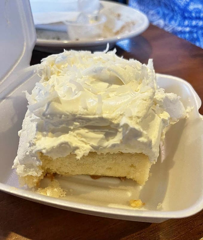 A slice of coconut cream cake that would make your grandmother both proud and jealous. Cloud-like frosting that demands a moment of silence.