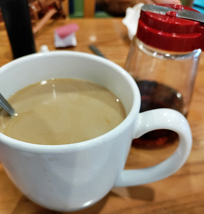 The elixir of morning people everywhere, served hot and often. This isn't just coffee &ndash; it's liquid motivation with unlimited refills.