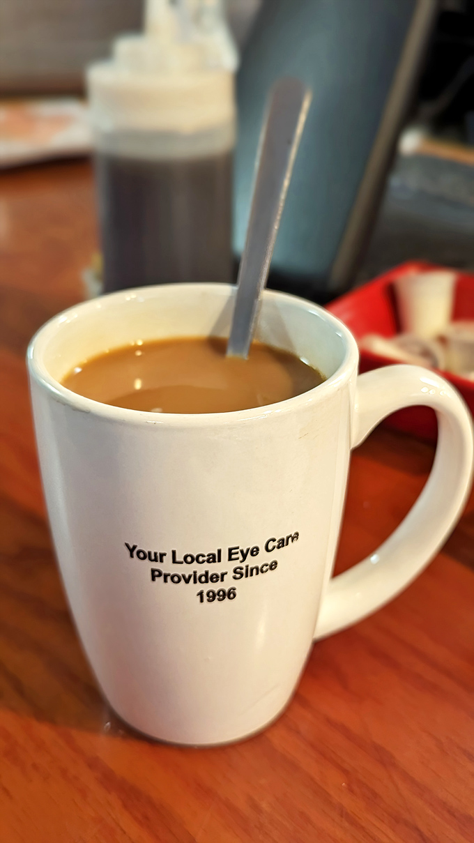 Even the coffee mugs tell stories here &ndash; this one apparently moonlights as an advertisement for eye care when it's not delivering caffeine.