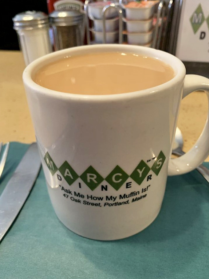 Ask Me How My Muffin Is! The mug says it all &ndash; coffee served with personality and none of that big-city pretension.