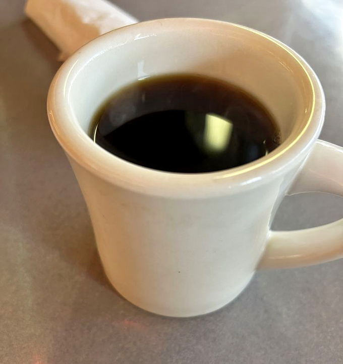 The coffee at Neptune isn't fancy, but it's honest—a sturdy companion for marathon conversations and pie contemplation.