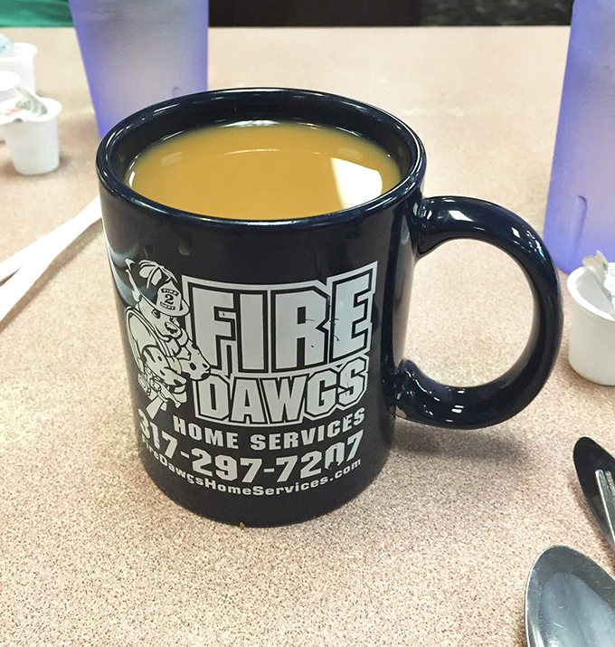 Even the coffee mugs have personality here &ndash; this one advertising local services while containing the life-giving elixir every breakfast requires.