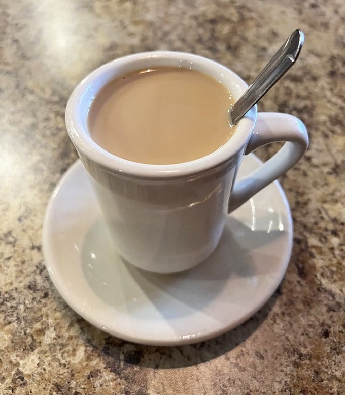 The humble diner coffee mug &ndash; holding the elixir that transforms morning zombies into functioning humans since time immemorial.