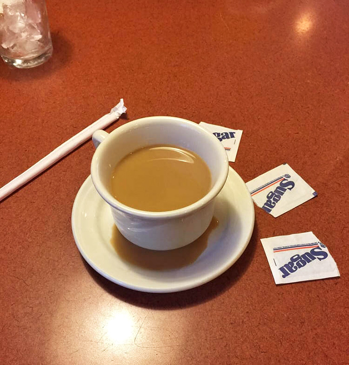 The humble coffee cup &ndash; breakfast's most loyal companion &ndash; stands ready for duty with its promise of caffeinated salvation.