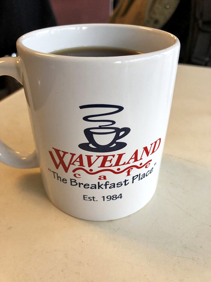 The coffee mug tells you everything: established 1984, but the coffee inside tastes like they've been perfecting it for centuries.
