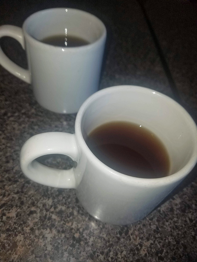 Simple white mugs cradle the lifeblood of diners everywhere—strong, honest coffee that doesn't need fancy names or elaborate preparation to get the job done.