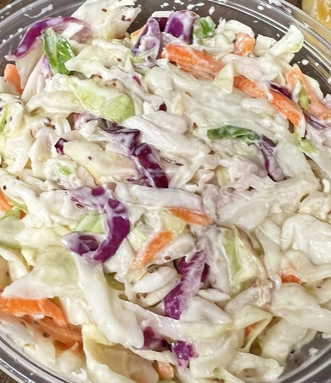 Coleslaw at lesser places is an afterthought. Here, it's the cool, crisp counterpoint that makes the barbecue sing even louder.