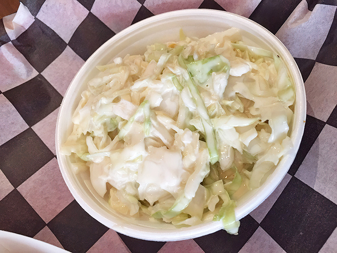 Coleslaw that knows its role &ndash; cool, crisp counterpoint to smoky meat. Not just a side dish, but an essential supporting character.