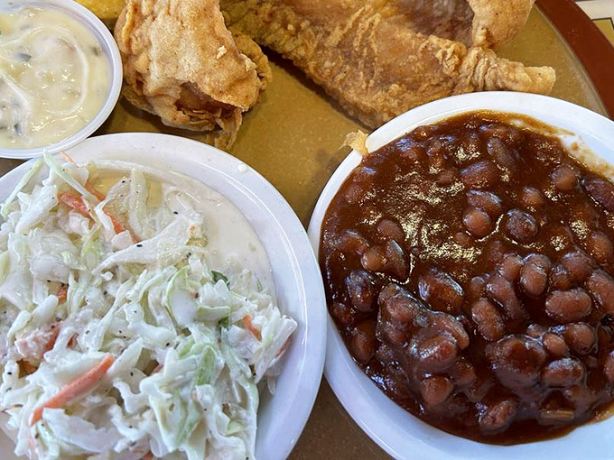 Coleslaw and baked beans: the dynamic duo that's been supporting smoked meats since barbecue became civilization.