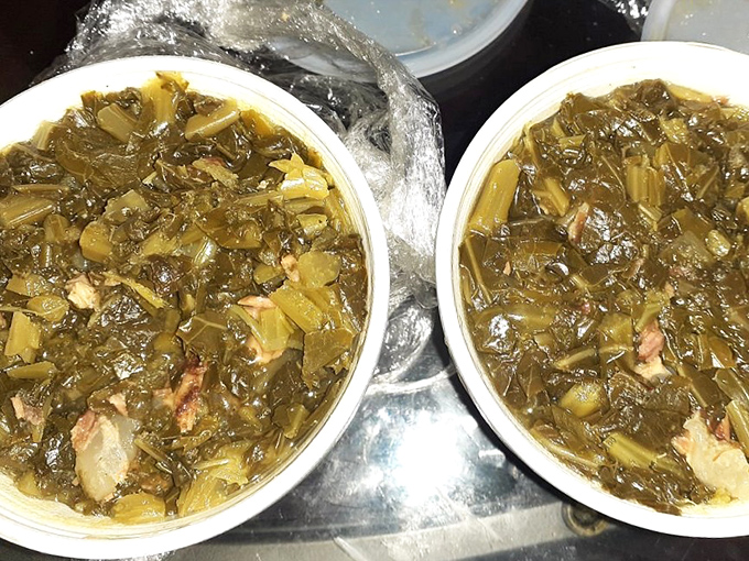 Collard greens that have been cooking so long they're practically part of the family, with bits of pork playing hide and seek.