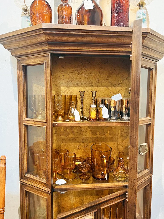 Shelves of mysteries and memories, where someone's collection becomes your new obsession at garage sale prices.