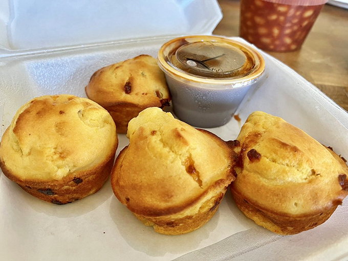 Cornbread muffins with just the right sweetness, ready to soak up any wayward sauce. They're the unsung heroes of the barbecue experience.