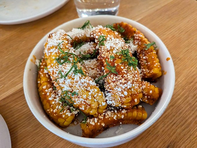 These corn riblets wear their cheese coating like a fancy tuxedo, proving vegetables can party with the best.