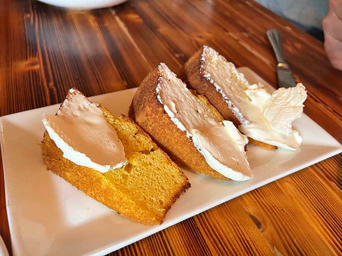 Cornbread that strikes the perfect balance between sweet and savory, topped with a honey butter crown fit for royalty.