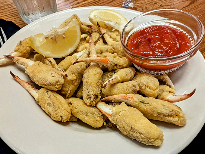 These golden-fried crab fingers, served with zesty cocktail sauce, make sharing nearly impossible&mdash;you'll want them all to yourself.