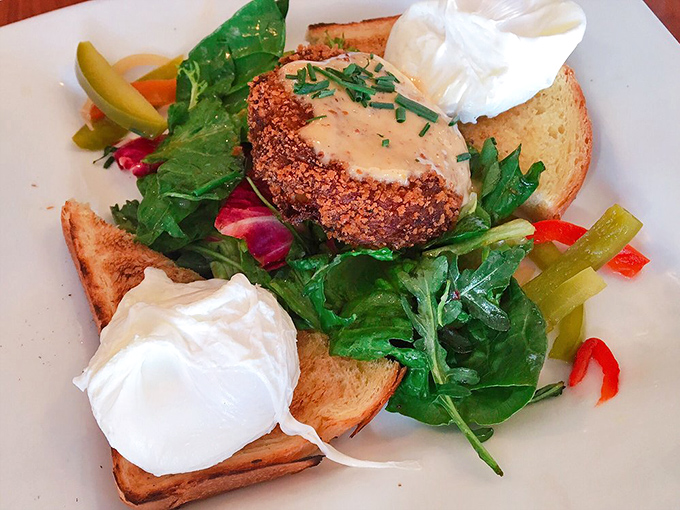 This isn't just a crab cake&mdash;it's an island of crispy-tender seafood perfection in a sea of fresh greens and poached egg pearls.