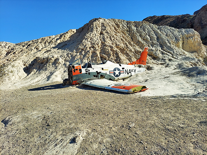 Not your typical desert mirage&mdash;an actual Navy plane crashed and abandoned. Top Gun: The Retirement Years looks surprisingly photogenic against the limestone backdrop.
