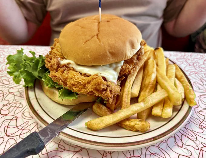 This isn't just a sandwich; it's architecture&mdash;a golden-fried chicken masterpiece supported by fresh lettuce and a perfectly toasted bun.