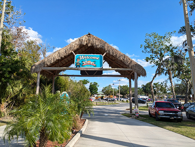 Thatched roof, tropical vibes, and a welcome sign that might as well say "Your blood pressure will drop 10 points upon entry."