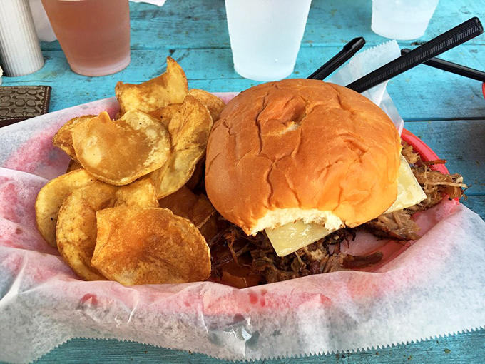 A pulled pork sandwich that doesn't need sauce to show off. Those house-made chips are the unsung heroes &ndash; crispy, salty perfection.