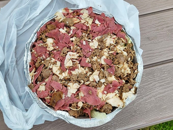 This isn't just a salad—it's a protein festival in an aluminum pan. Enough meat to make a vegetarian faint from across the street.
