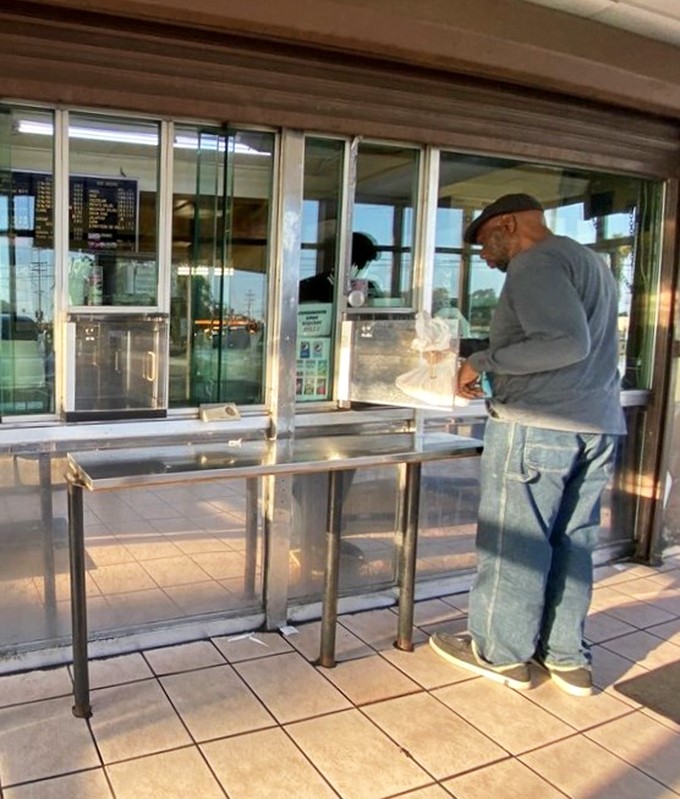 The outdoor pickup table: where patience is rewarded and anticipation builds while watching others leave with their golden treasures.