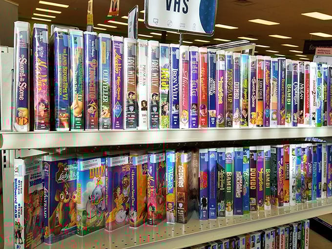 Nostalgia alert! VHS tapes of beloved children's classics line the shelves, perfect for collectors or those with vintage playback equipment.