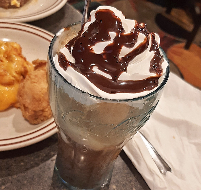A diet Coke float proves that sometimes rebellion comes topped with whipped cream and chocolate drizzle.