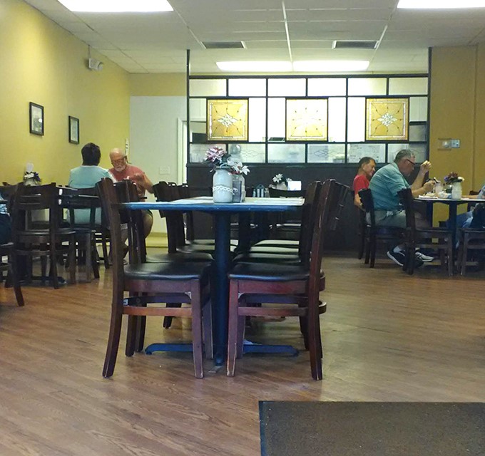 The mid-morning lull, when conversations bloom between tables and coffee cups get refilled without asking. This is community in its purest form.