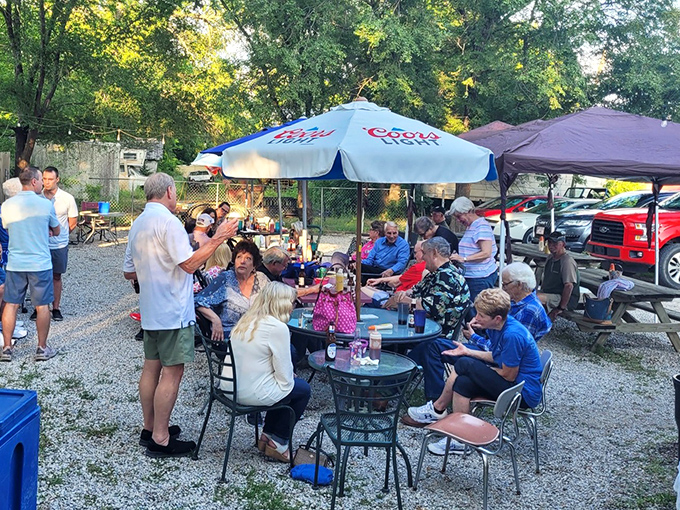 When summer evenings call for community and cold drinks, Prairie Nut Hut's outdoor seating becomes Altoona's living room. Neighbors becoming friends under Coors Light umbrellas.