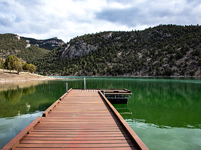 This wooden dock stretches into emerald waters like an invitation to adventure. Just add fishing pole and sunset for peak relaxation.