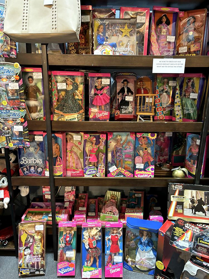 Barbie's historical timeline displayed in pristine packaging&mdash;from career woman to fashion icon, all without a single wrinkle.