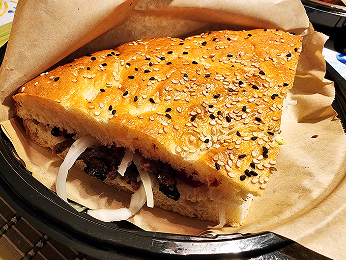 This sandwich doesn't just satisfy hunger&mdash;it abolishes it. Sesame-studded bread housing savory fillings that would make any deli proud.