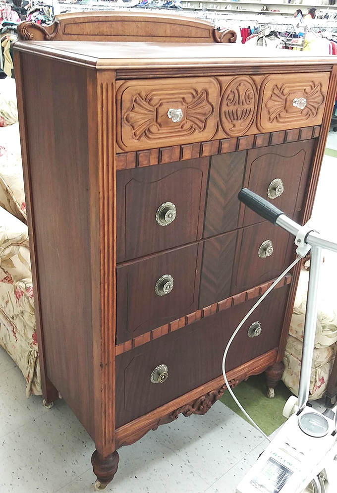 This vintage dresser isn't just furniture—it's time travel. Those hand-carved details whisper tales from an era when craftsmanship trumped convenience.