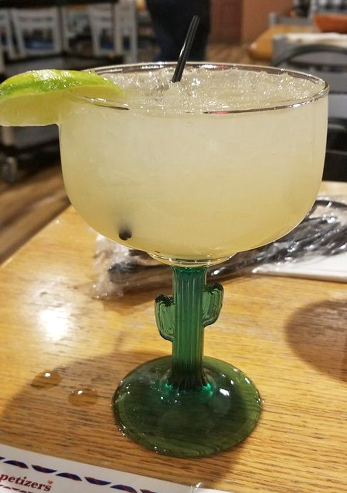 The cactus-stemmed margarita glass isn't just cute—it's a desert oasis of tequila-kissed refreshment that practically demands a "one more, please."