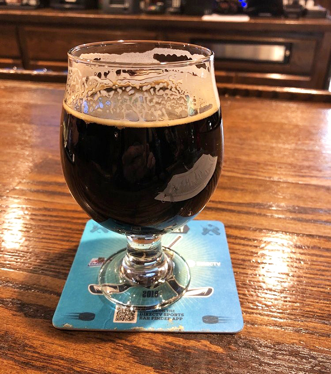 A proper dark beer in a proper glass. The kind that makes you slow down and appreciate life's simple pleasures.