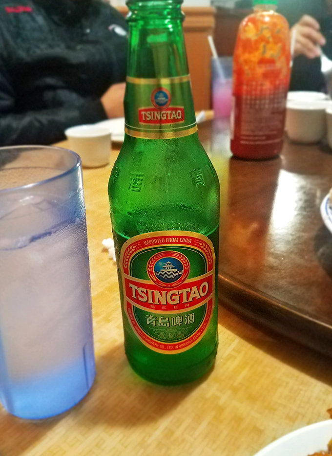 Nothing complements a Chinese feast like an ice-cold Tsingtao. This emerald bottle contains liquid refreshment that cuts through spice like a samurai through silk.