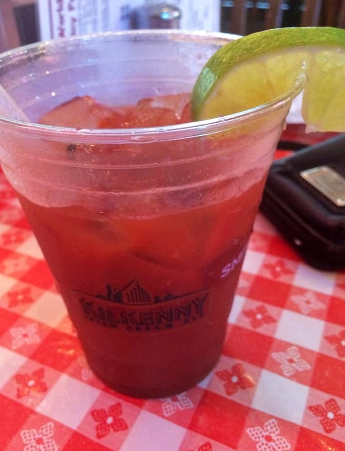 A perfectly sweating glass of something cold and refreshing, garnished with lime. In the chicken universe, this is what astronomers call the perfect counterbalance.